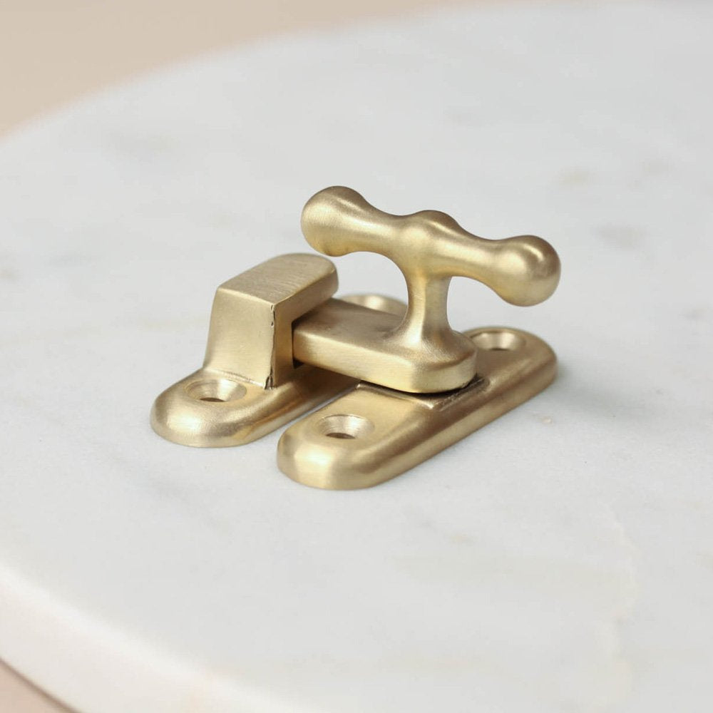 Cupboard catches - Cupboard door catches - Brushed brass